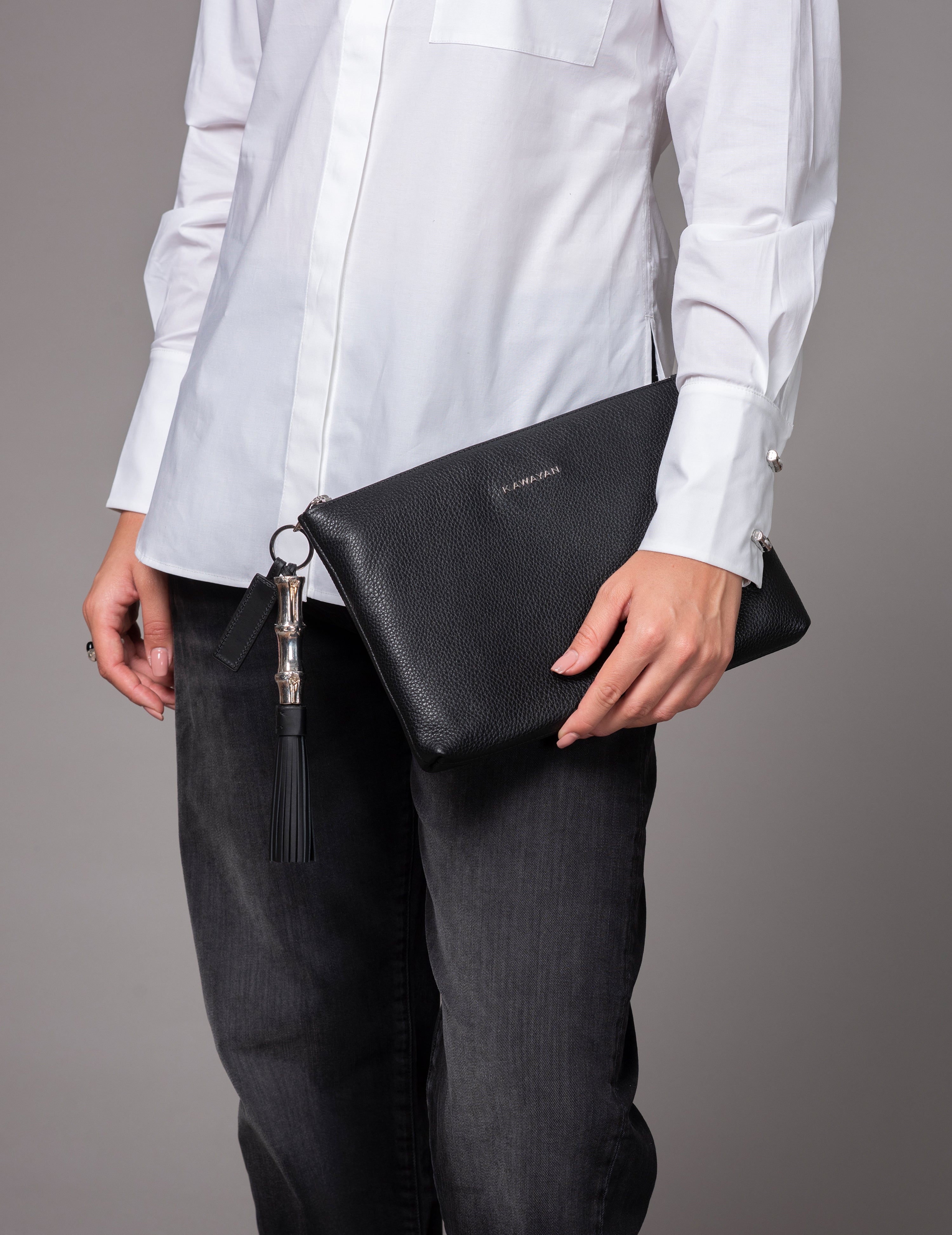 FLOATER LEATHER SIGNATURE CLUTCH BAG – KAWAYAN